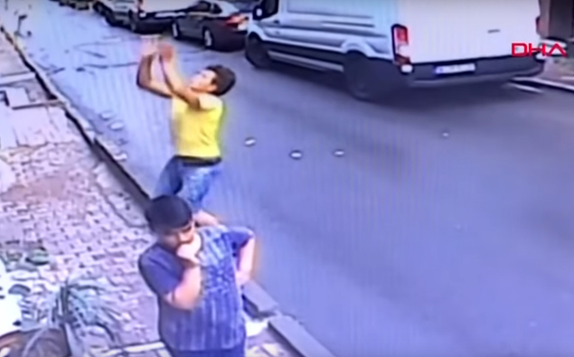Watch the terrifying moment a baby falling from window is caught by boy ...